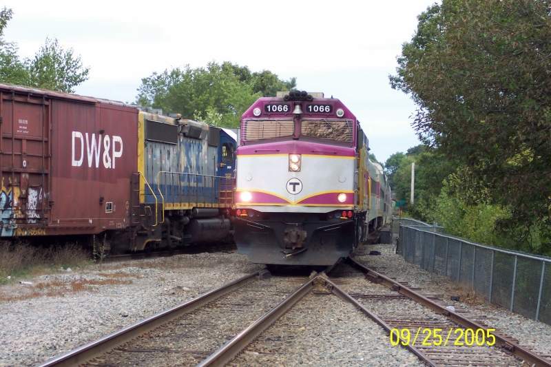 Close up of MBTA 1066 leading train 2709 as it enters Walpole station ...